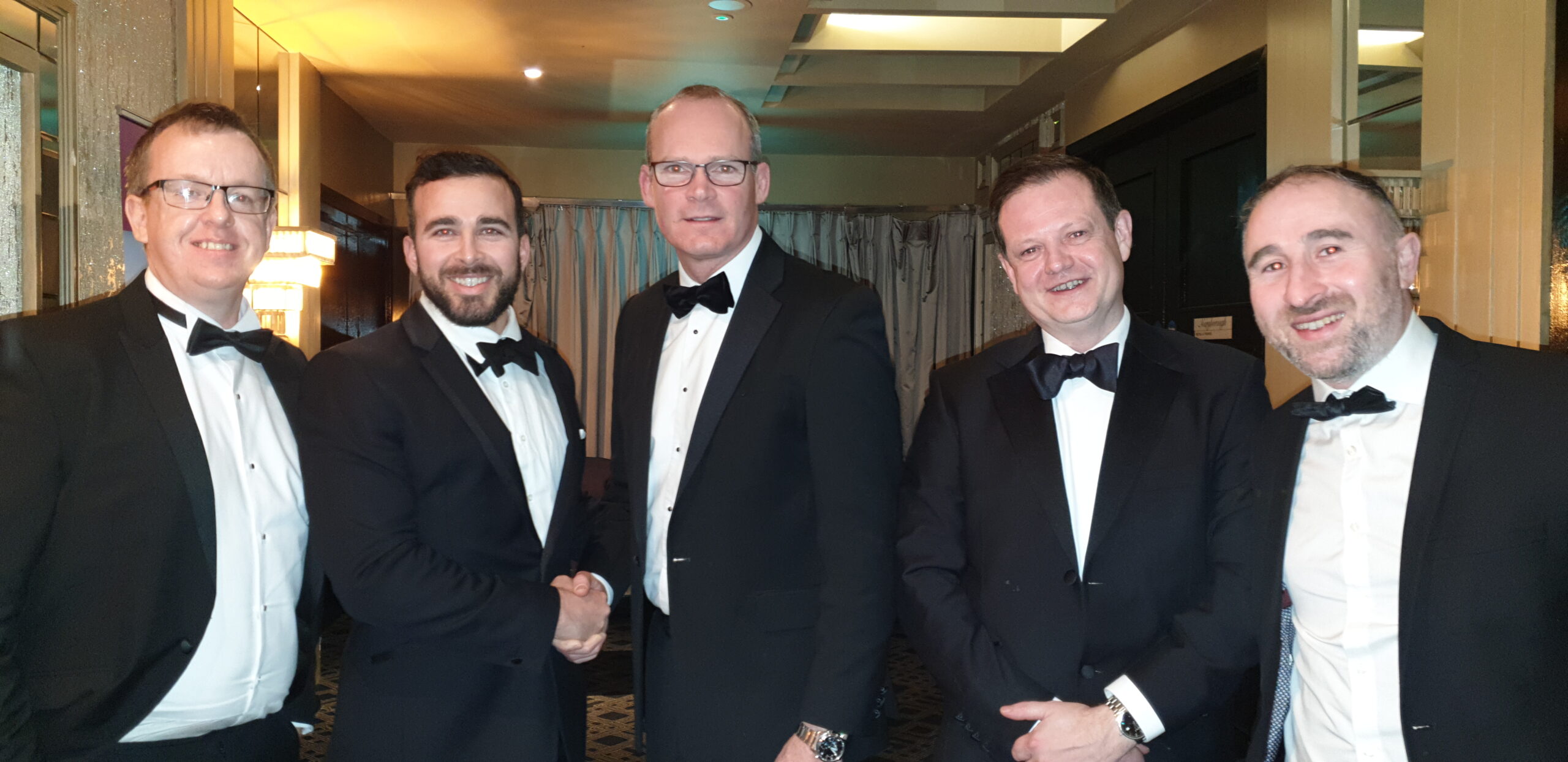 AtkinsRéalis team with Táiniste Simon Coveney at Cork Region IEI Dinner ...